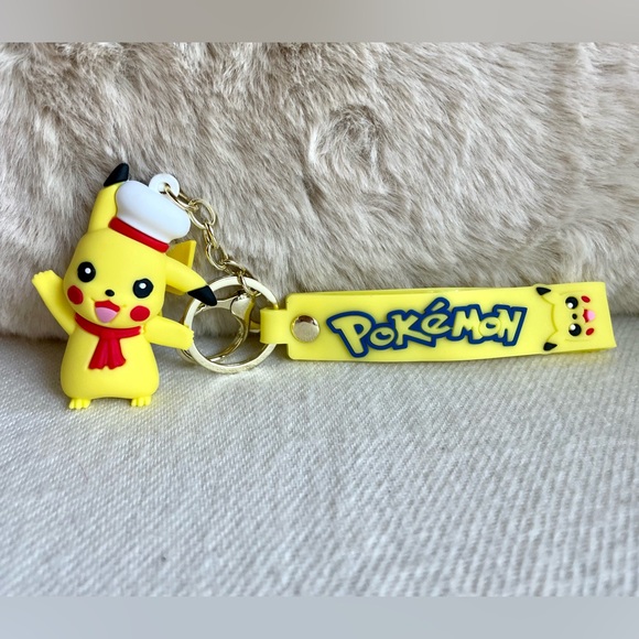 Pokemon | Accessories | Nwot Pokmon Pikachu Bag Charm With Wristlet And ...